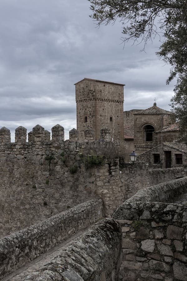 Medieval Castle Walls and Tower Rising Under Cloudy Sky Stock Photo ...