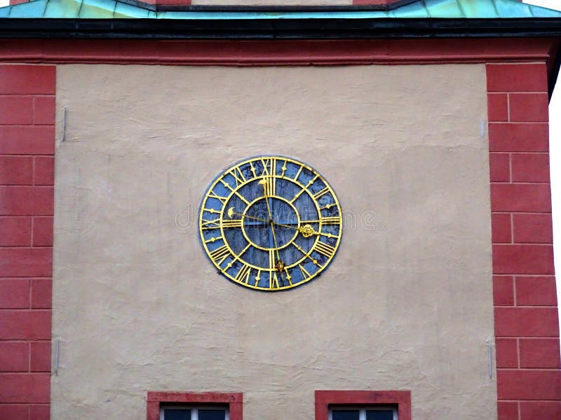 Medieval clock on building stock image. Image of decorative - 254432103
