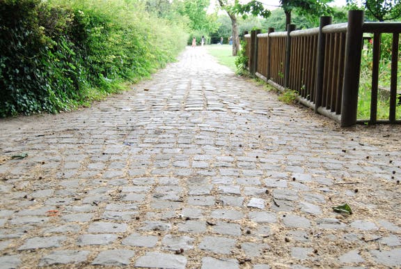 Medieval Cobblestone Footpath in Saint Denis Park Stock Photo - Image ...