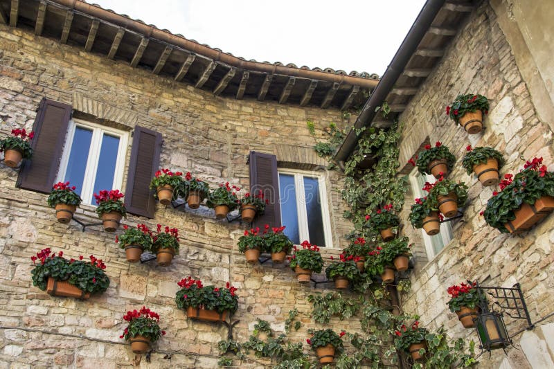 Medieval Corner with Flower and Pots. Stock Photo - Image of historic ...