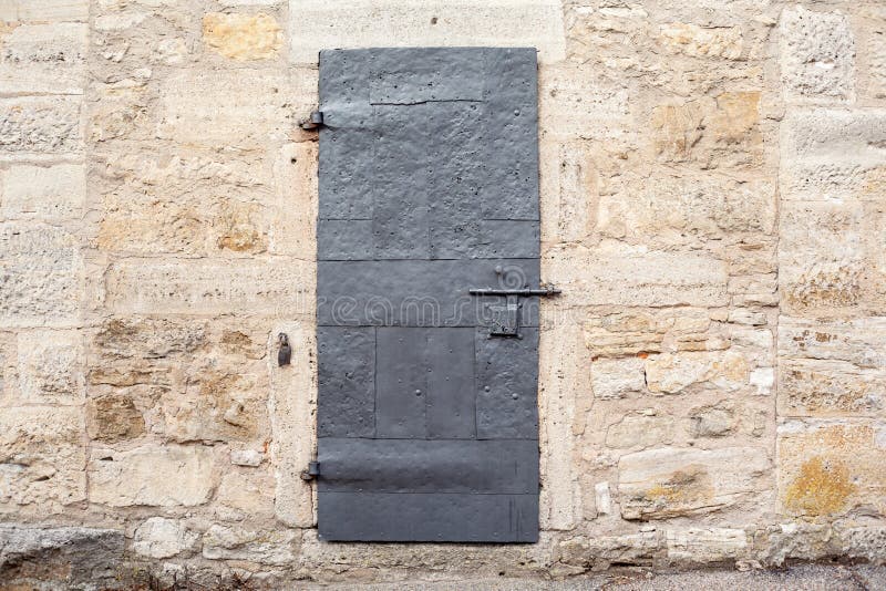 Medieval Dungeon Door on an Antique German Castle Wall Stock Image ...