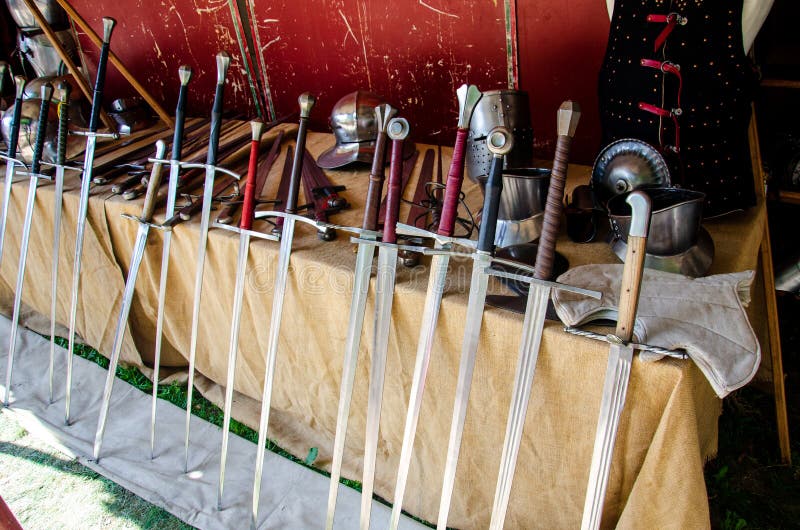 Medieval Gun Smith Shop. Swords and Armor for Sale Stock Image - Image ...