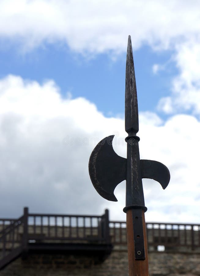 Medieval Halberdpike in Front of the Castle Wall and Cloudy Sky ...