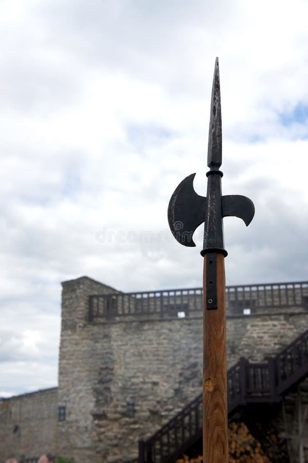 Medieval Halberdpike in Front of the Castle Wall and Cloudy Sky ...