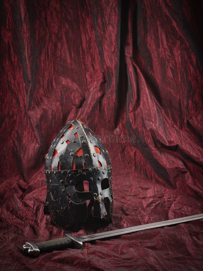 Medieval helmet and sword stock image. Image of sword - 51668221