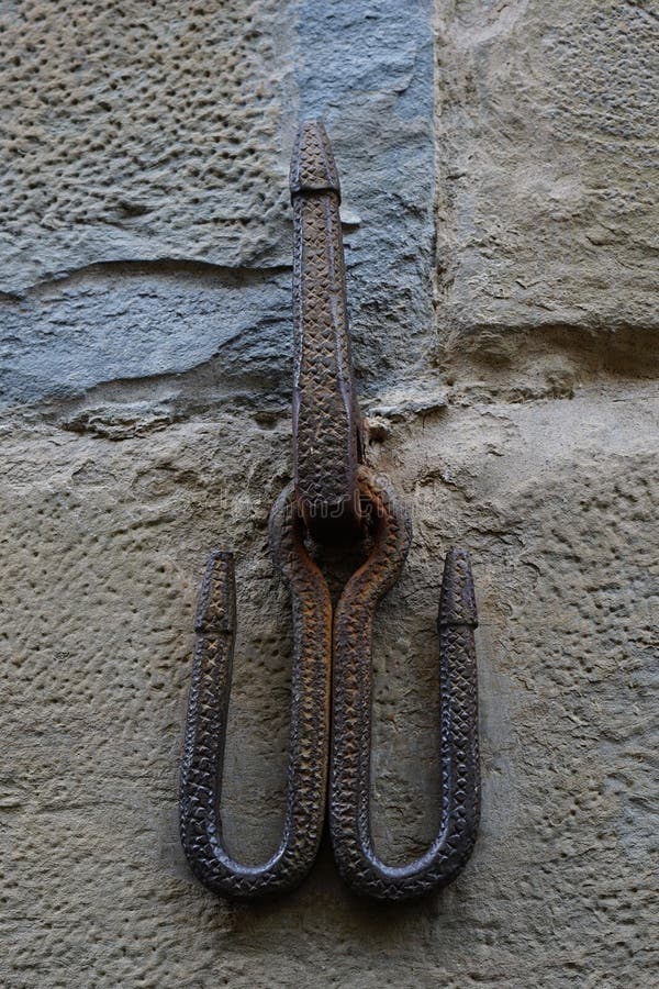 Medieval Iron Torch Holder on Stone Wall Stock Image - Image of ...