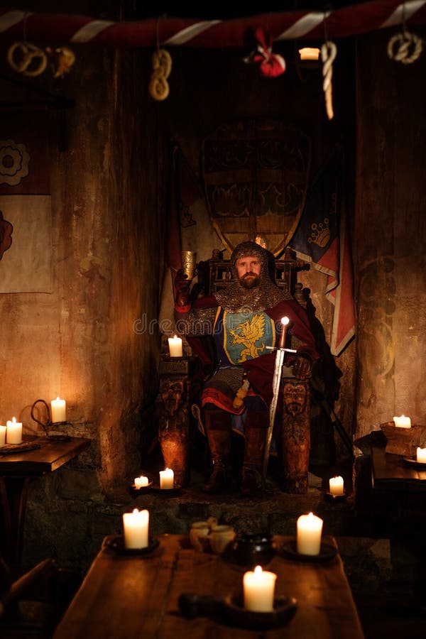 Medieval King with Goblet of Wine on the Throne in Ancient Castle ...