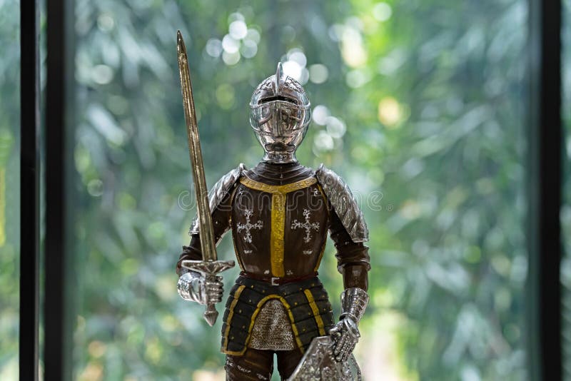 Medieval Knight Gothic Plate Armour on Green Bokeh Background. Stock ...