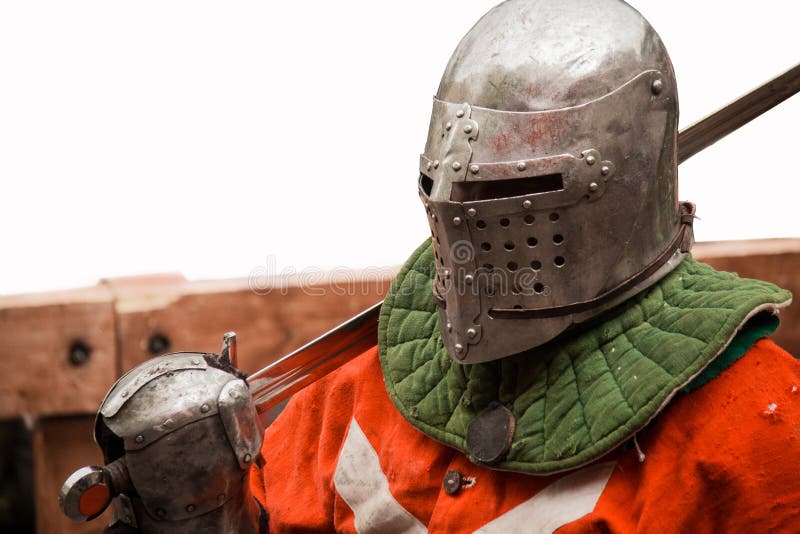Medieval Knight in Helmet with Sword Stock Photo - Image of lowered ...