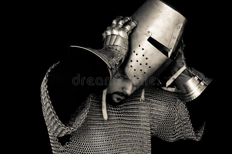 Medieval Knight Removing Helmet Stock Photo - Image of loyal, gauntlet ...