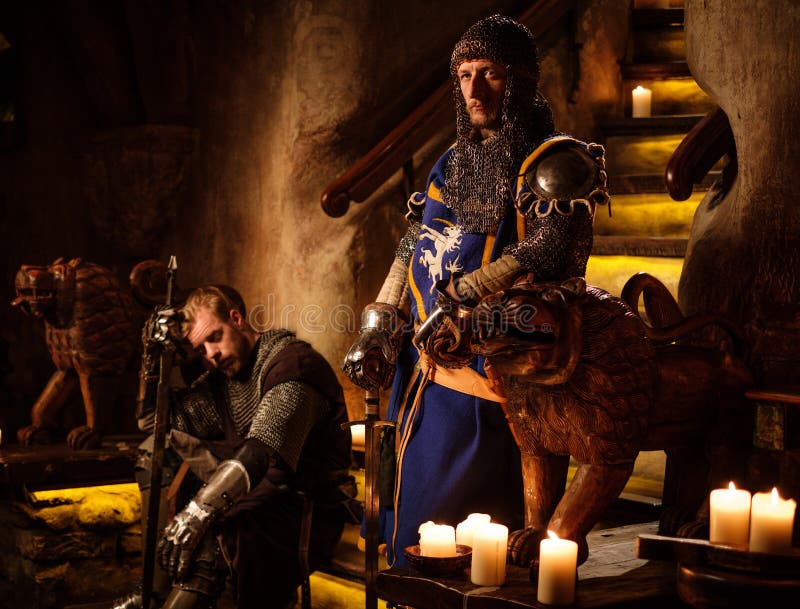 Knight Holding Sword Behind His Back Stock Photo - Image of aggression ...