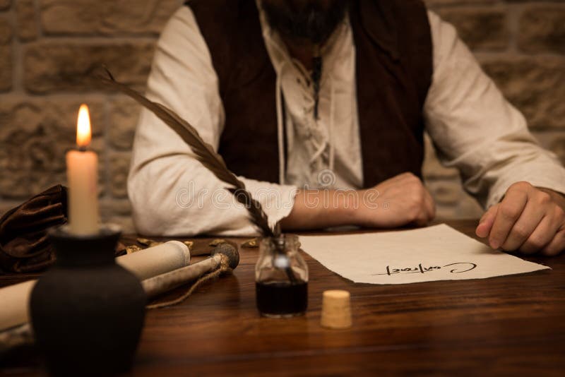 Medieval Man Sitting on a Table with a Contract, Concept Business Stock ...