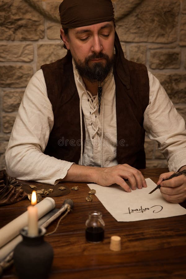 Medieval Man Sitting on a Table and Sign a Contract Stock Photo - Image ...