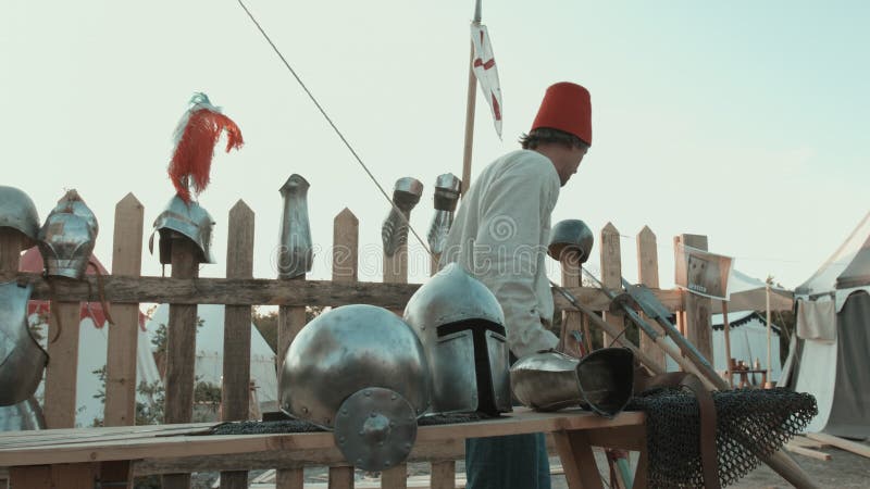 Medieval Master Rubbing Iron Armor, Helmets and Swords Stock Footage ...
