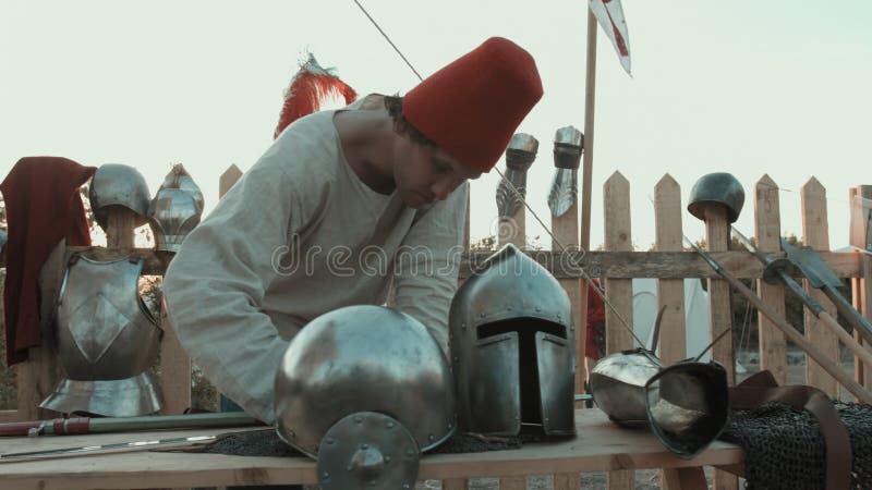 Medieval Master Rubbing Iron Armor, Helmets and Swords Stock Video ...