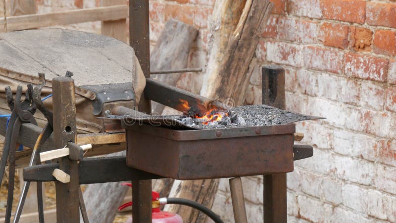 Medieval Method of Forging Iron, the Blacksmith Forges an Iron Nail ...