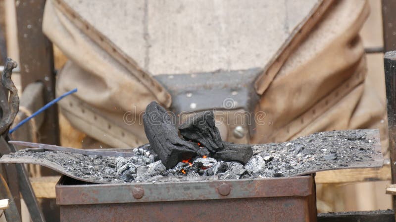 Medieval Method of Forging Iron, the Blacksmith Forges an Iron Nail ...