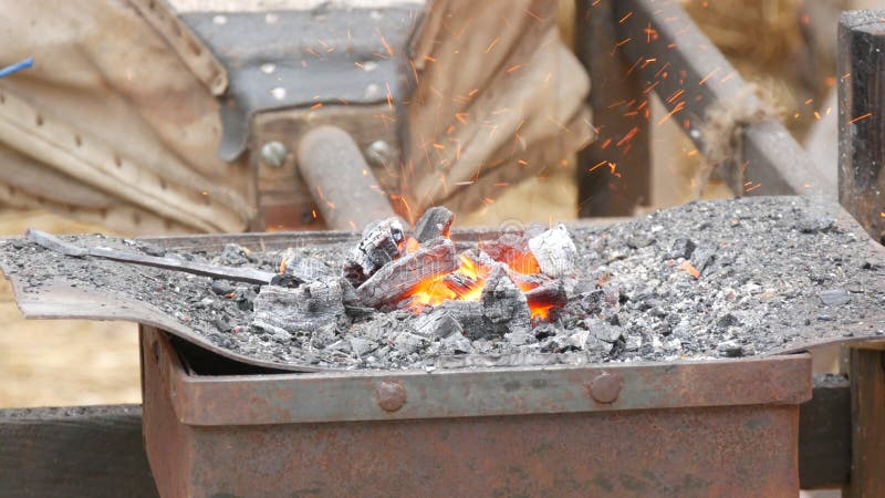 Medieval Method of Forging Iron, the Blacksmith Forges an Iron Nail ...