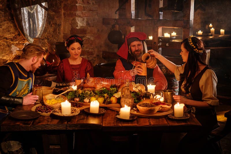 Medieval People Eat and Drink in Ancient Castle Kitchen Interior Stock ...