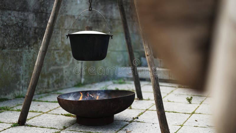 Medieval Pot Hanging Over Fire Stock Image - Image of handle, smoke ...