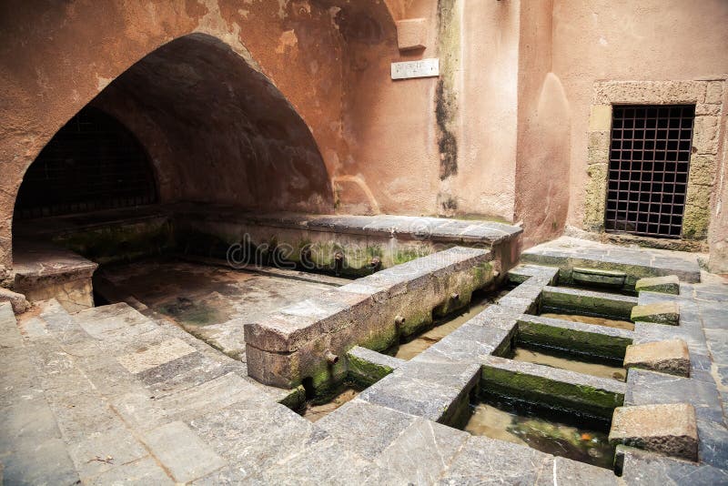 Medieval Laundry stock photo. Image of public, sink, italy - 27111244