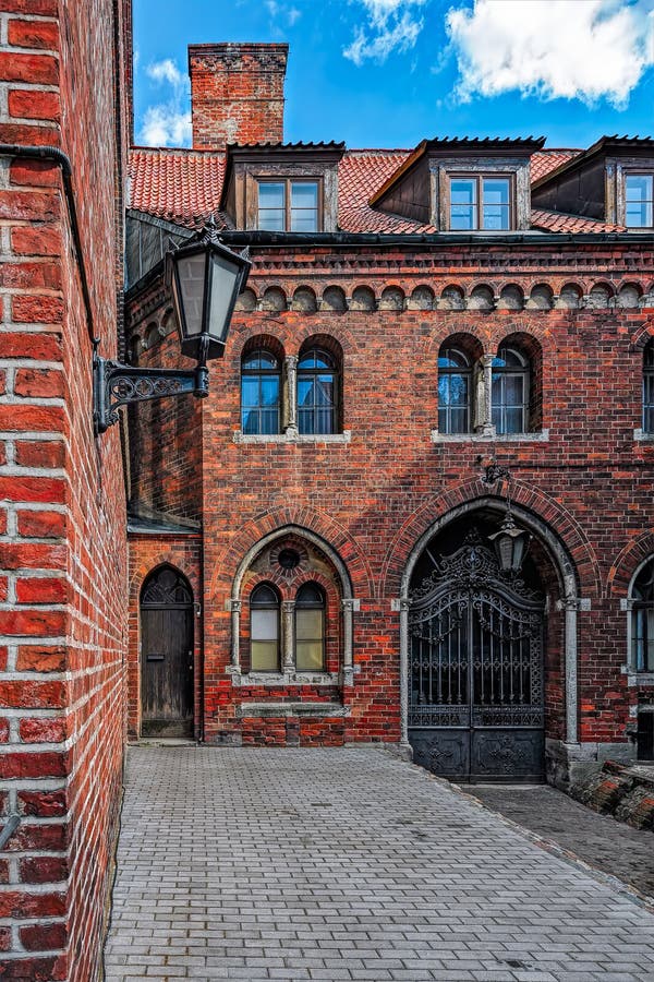 Medieval red brick house stock image. Image of people - 72441497