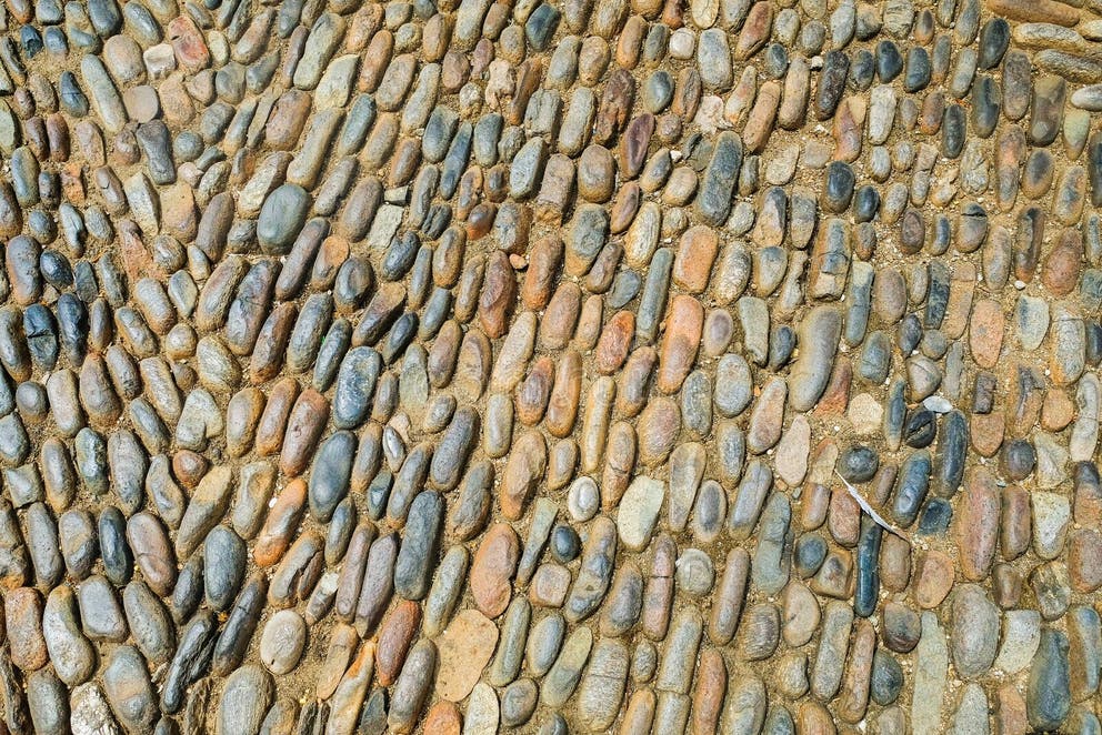 Medieval Road Surface Paved by Cobblestone, Spain. Background and ...