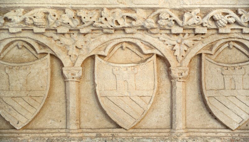 Medieval Shield in Stone Wall Texture Backgrouund Stock Photo - Image ...