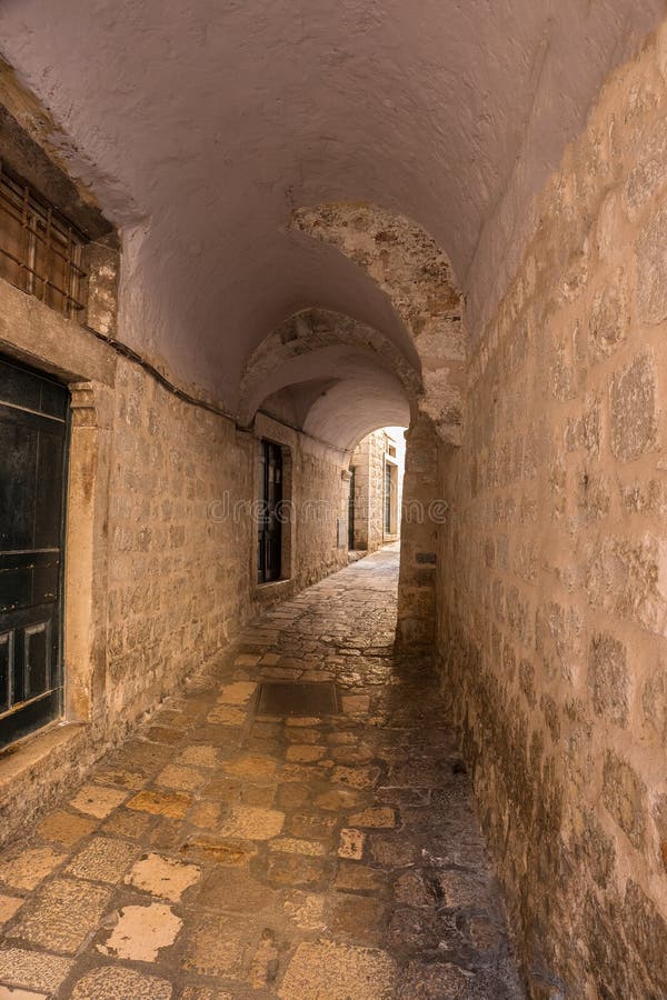 Medieval Stone Arched Corridor with a Stone Floor Stock Photo - Image ...