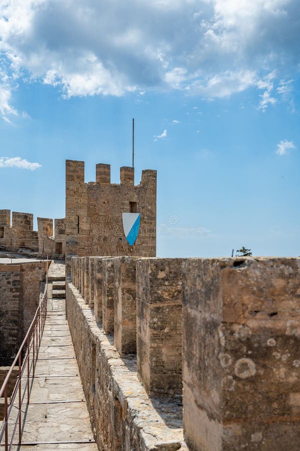 Medieval Stone Castle Wall with a Blue and White Shield Stock Image ...