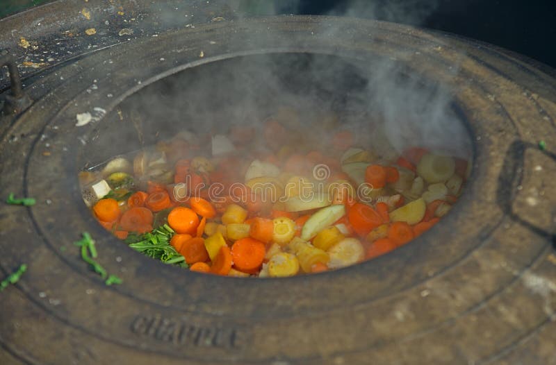 Medieval Style Cooking of Various Vegetables in Big Metal Pot Stock ...