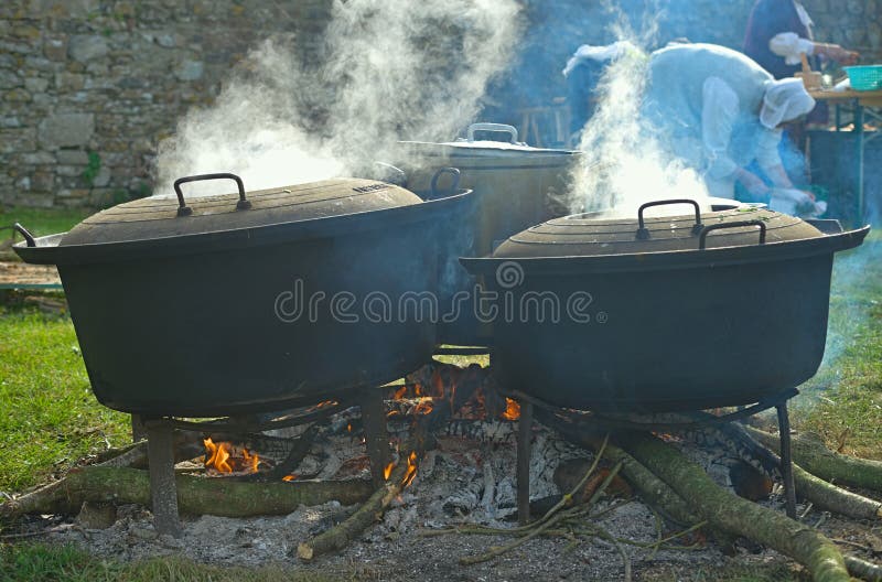 Medieval Style of Preparing Food with Three Pots Cooking on Wood Stock ...