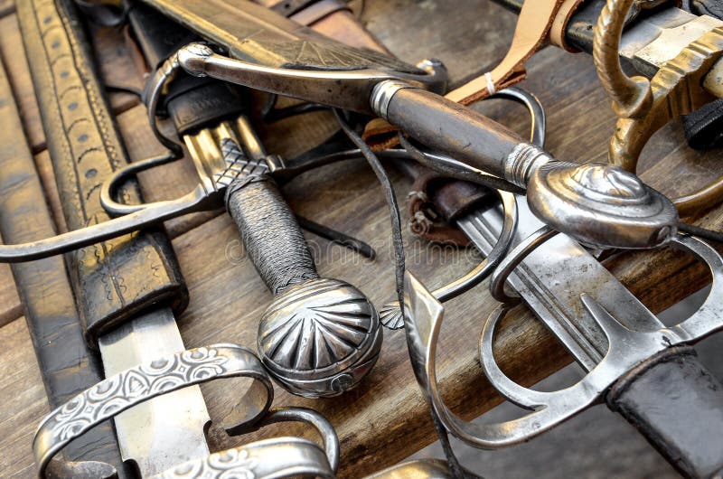 Medieval Swords on a Wood Table Stock Image - Image of historic, sharp ...