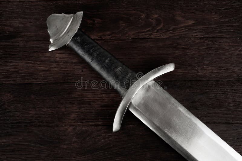 Medieval Sword on Wooden Background Stock Image - Image of sharp, fight ...