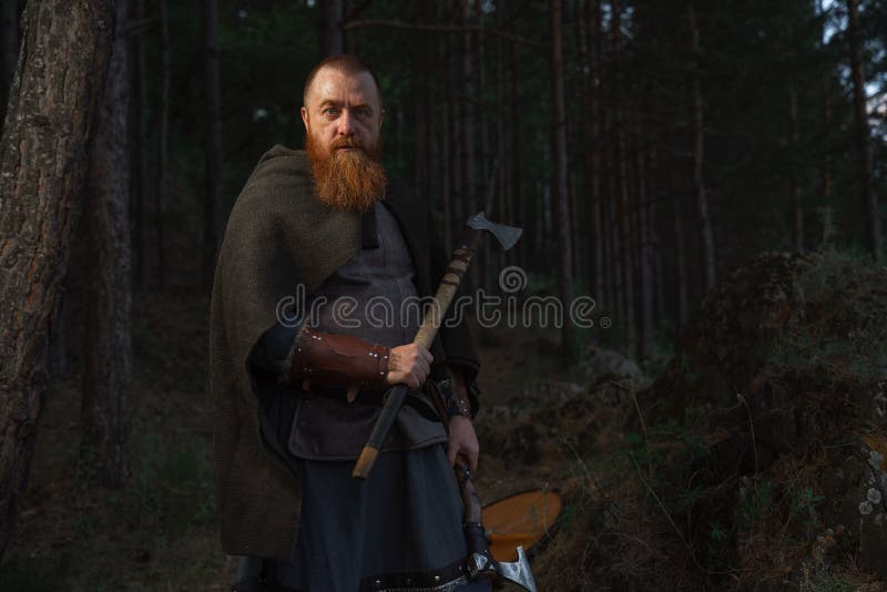 Medieval Warrior Viking Barbarian with Ax and Shield in Forest Stock ...