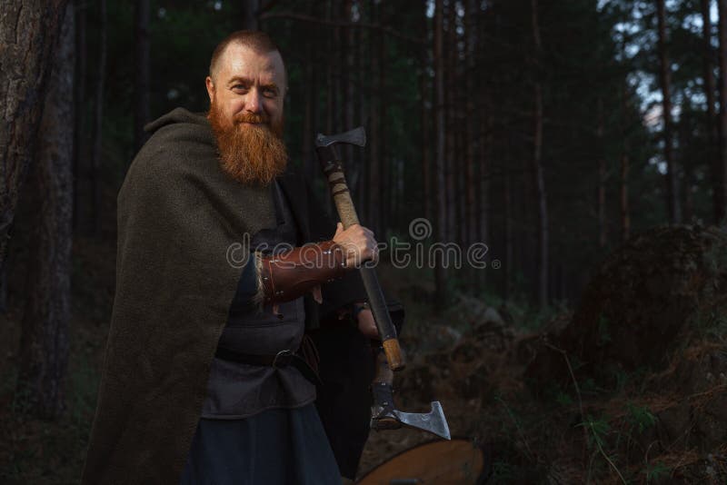 Medieval Warrior Viking Barbarian with Ax and Shield in Forest Stock ...