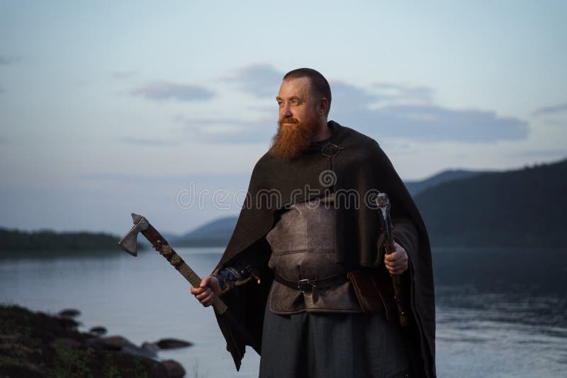 Medieval Warrior Viking Barbarian with Ax and Shield on Shore Stock ...
