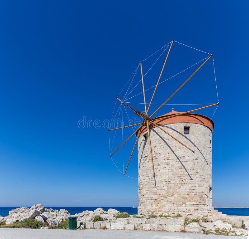 Medieval Windmill in Mandraki Port, Rhodes Stock Photo - Image of ...