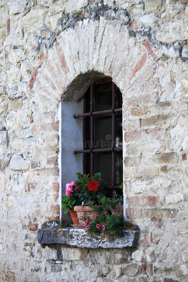 Medieval Window with Flowers Pots Stock Image - Image of arch ...