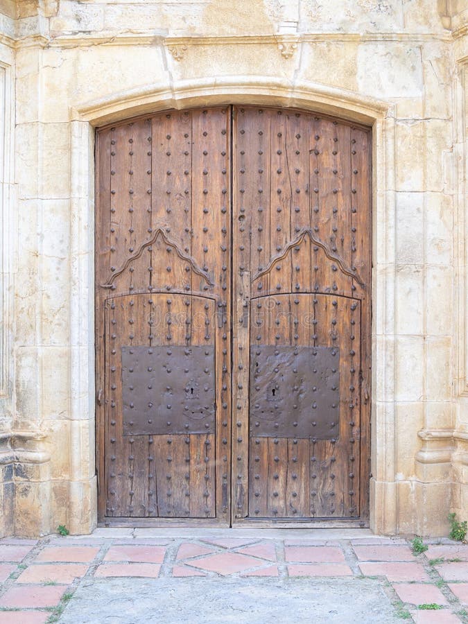 Medieval wooden doors stock image. Image of green, detail - 233722599