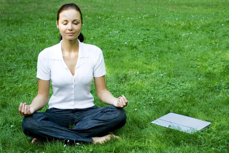 Meditating Woman with Laptop Stock Photo - Image of balance, grass: 6144912