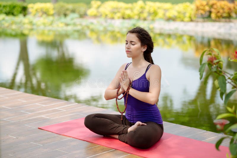 Meditating woman stock image. Image of yoga, relax, lifestyle - 56051101