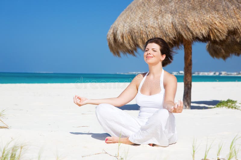 Meditation on the beach stock photo. Image of freshness - 13474542