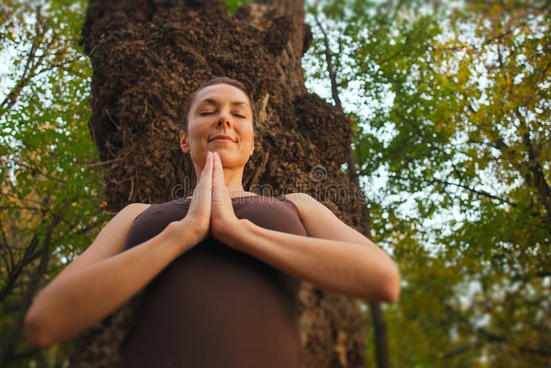 Meditation Next To the Tree Stock Photo - Image of eyes, activity ...