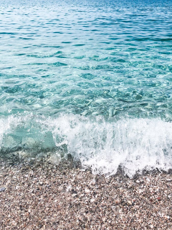 Mediterranean Clear Sea with Pebble Sand and Waves Stock Photo - Image ...