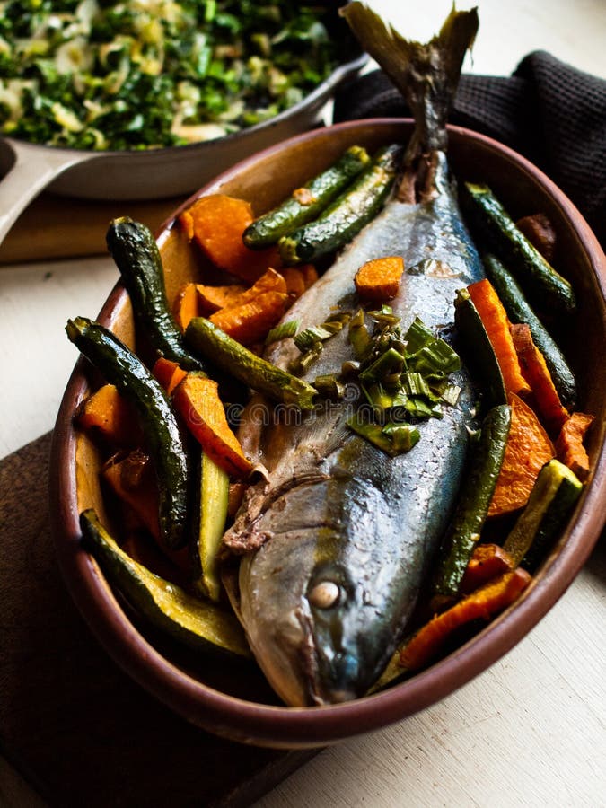 Mediterranean Fish and Vegetables in Natural Light on Table Stock Photo ...