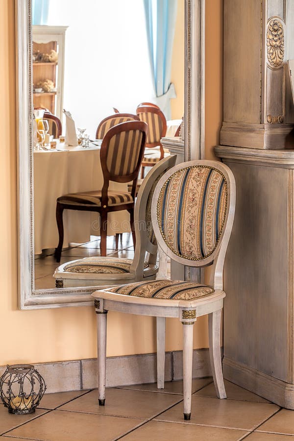 Mediterranean Interior - Mirror and Chair Stock Image - Image of chair ...