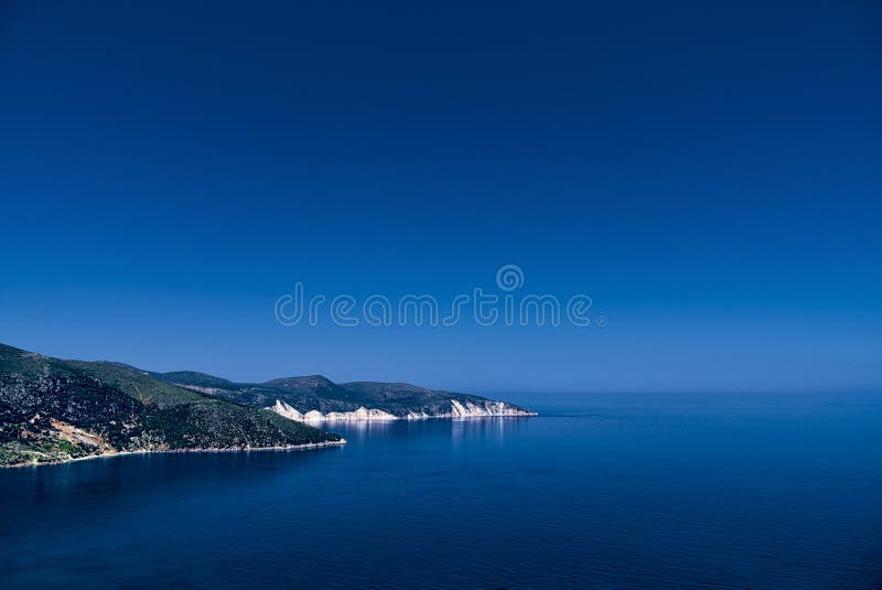 Promontory in the Deep Blue Sea Stock Photo - Image of beautiful ...