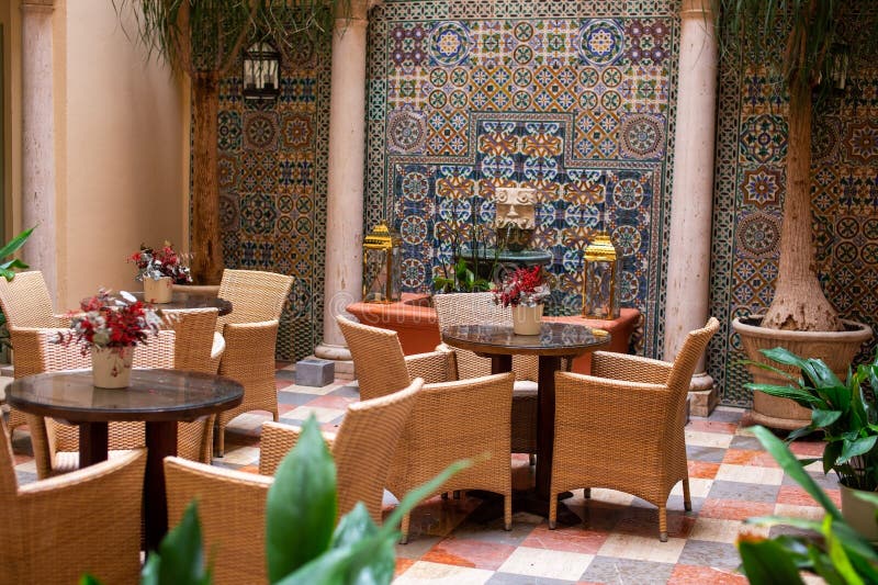 Mediterranean Patio Cafe, Tables and Chairs in a Restaurant Stock Image ...