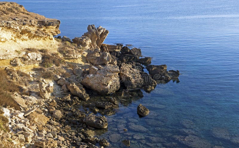 Rocks Off the Coast of Cyprus Stock Photo - Image of serenity, sunlight ...